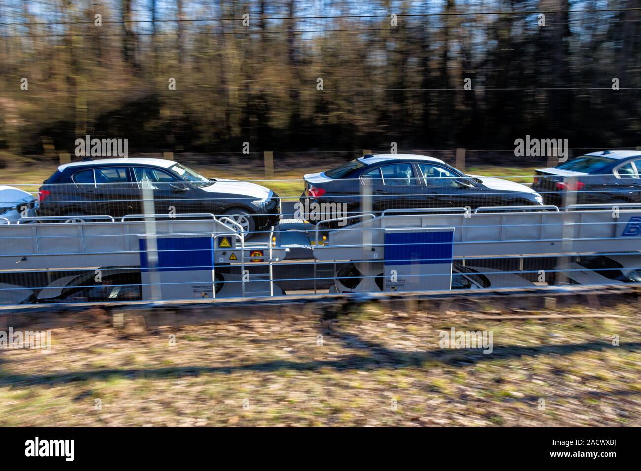New car on a freight train Stock Photo - Alamy