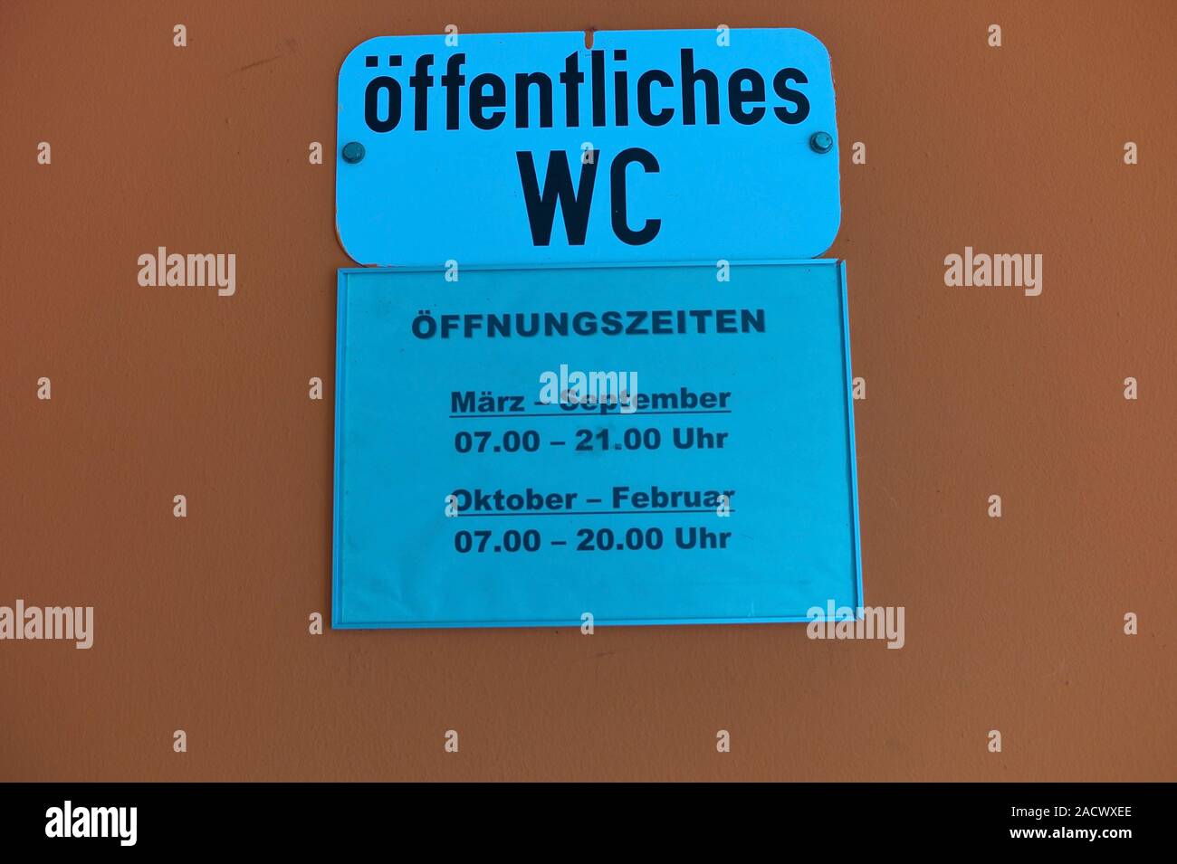 Public WC, Blue sign Stock Photo - Alamy