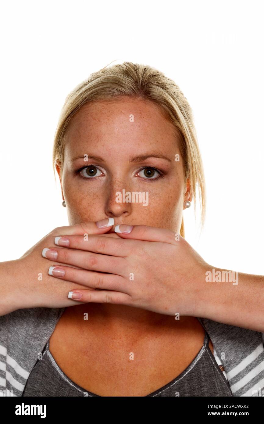 Woman keeps her mouth shut Stock Photo - Alamy