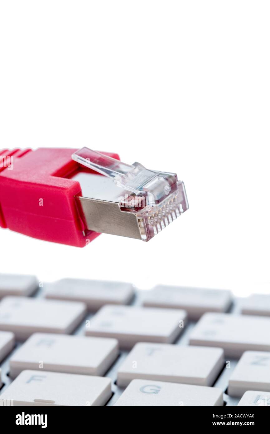 Network cable to keyboard Stock Photo - Alamy