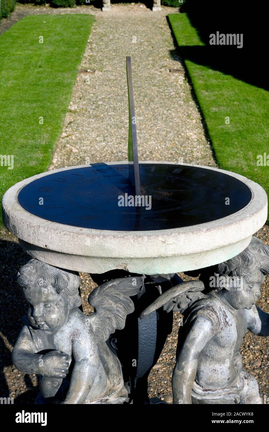 Antique garden sundial. This is a horizontal sundial design, with ...