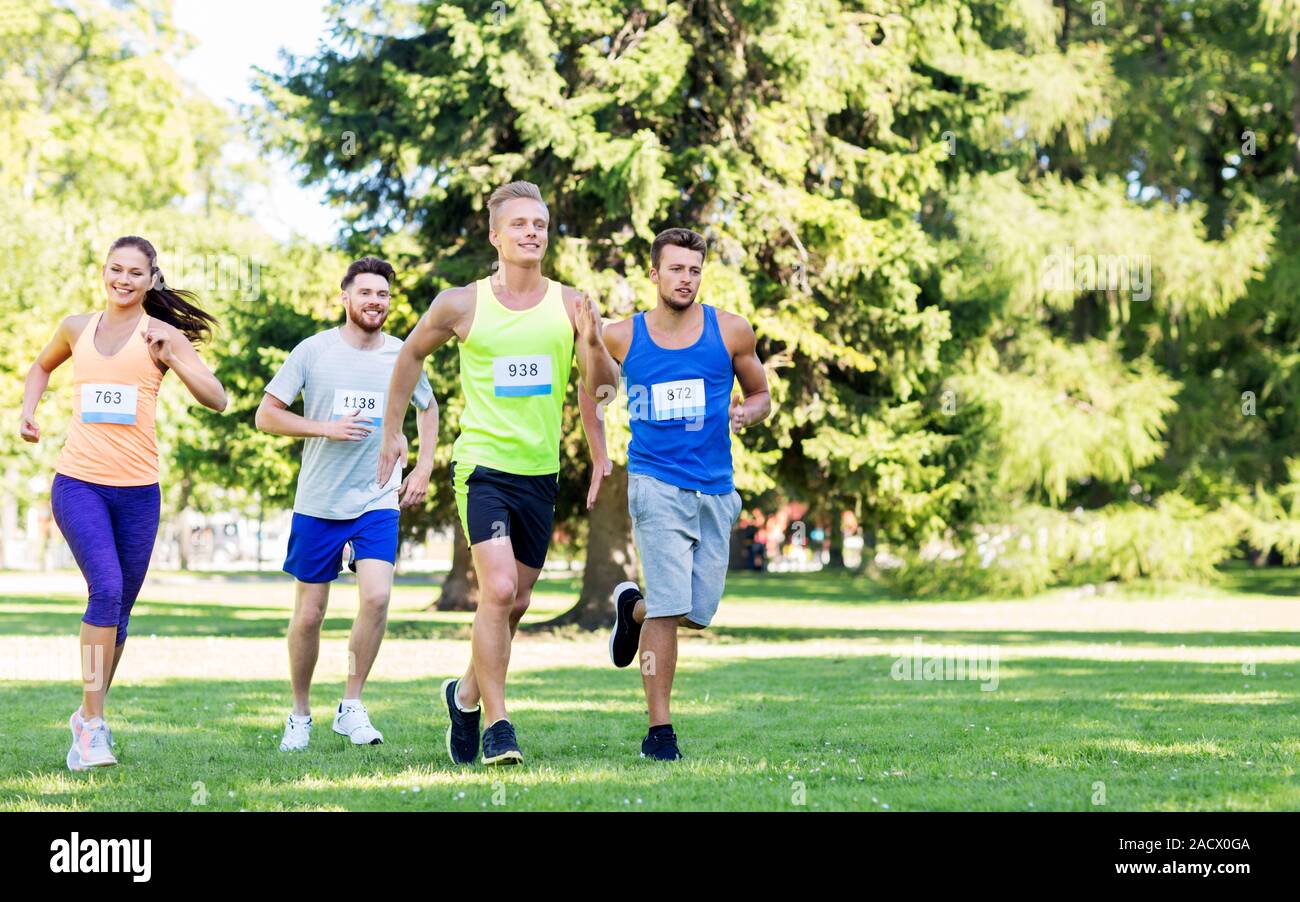 fitness, sport, race and healthy lifestyle concept - group of happy ...