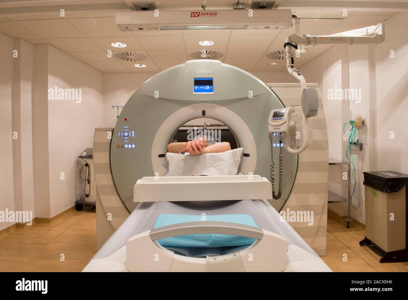A patient undergoes a computed tomography (CT) scan. CT scans are ...