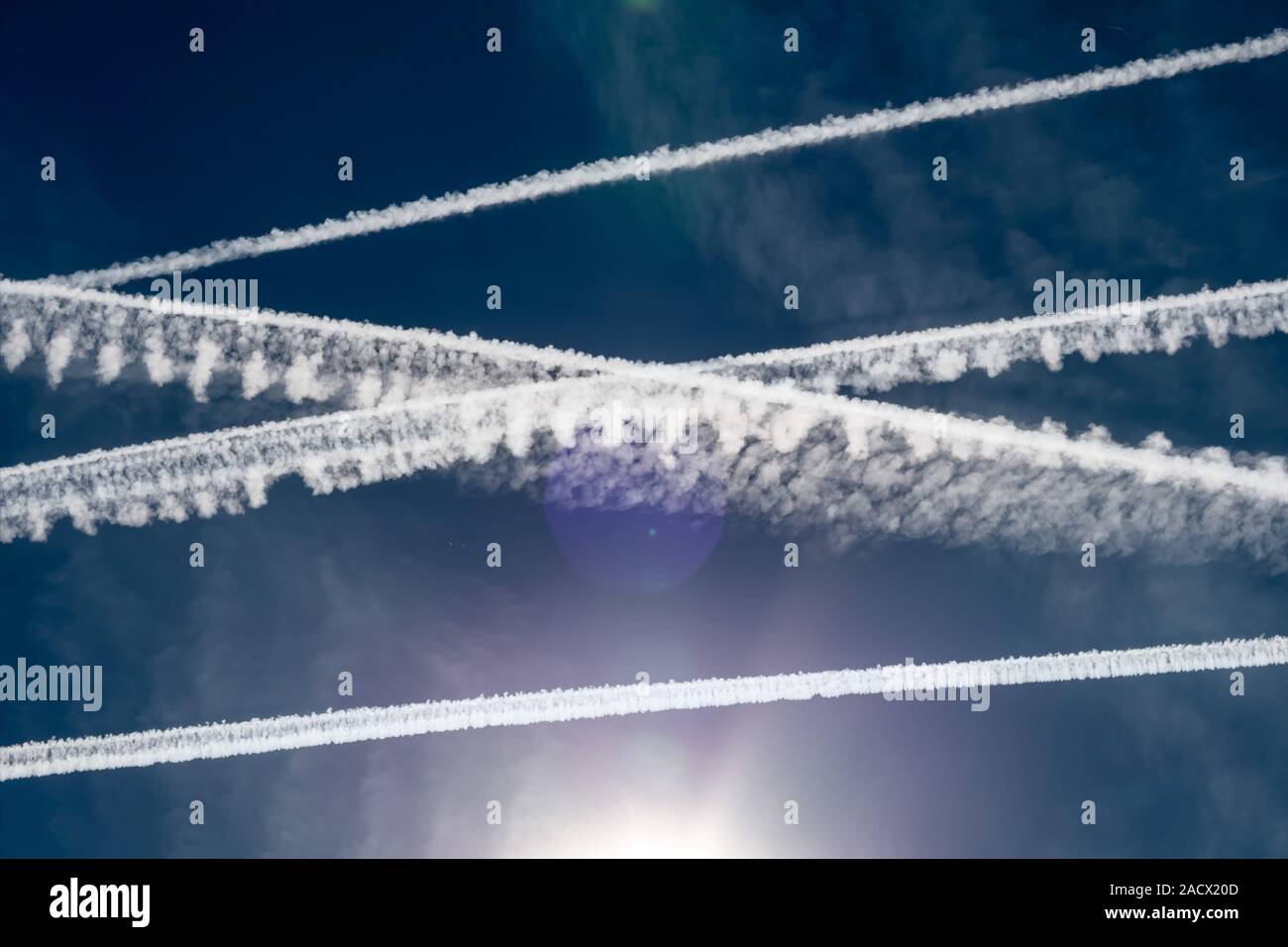 Condensation trails in the sky Stock Photo - Alamy