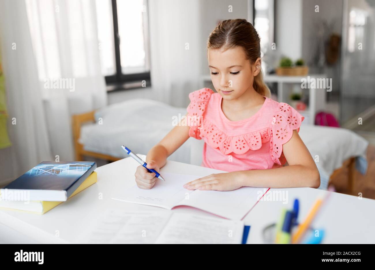 children, education and learning concept - student girl with book ...