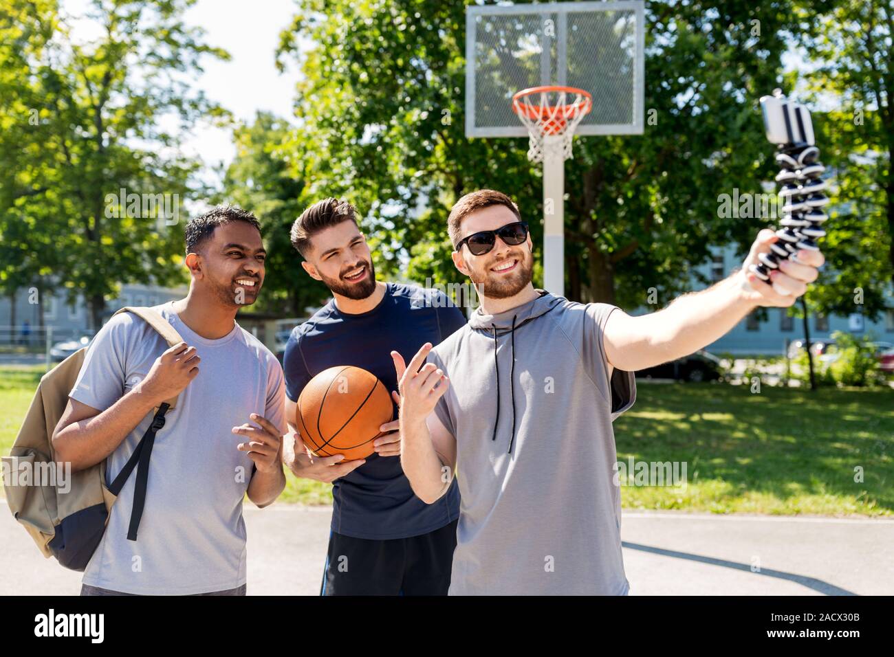 sport, leisure games and male friendship concept - group of happy men ...