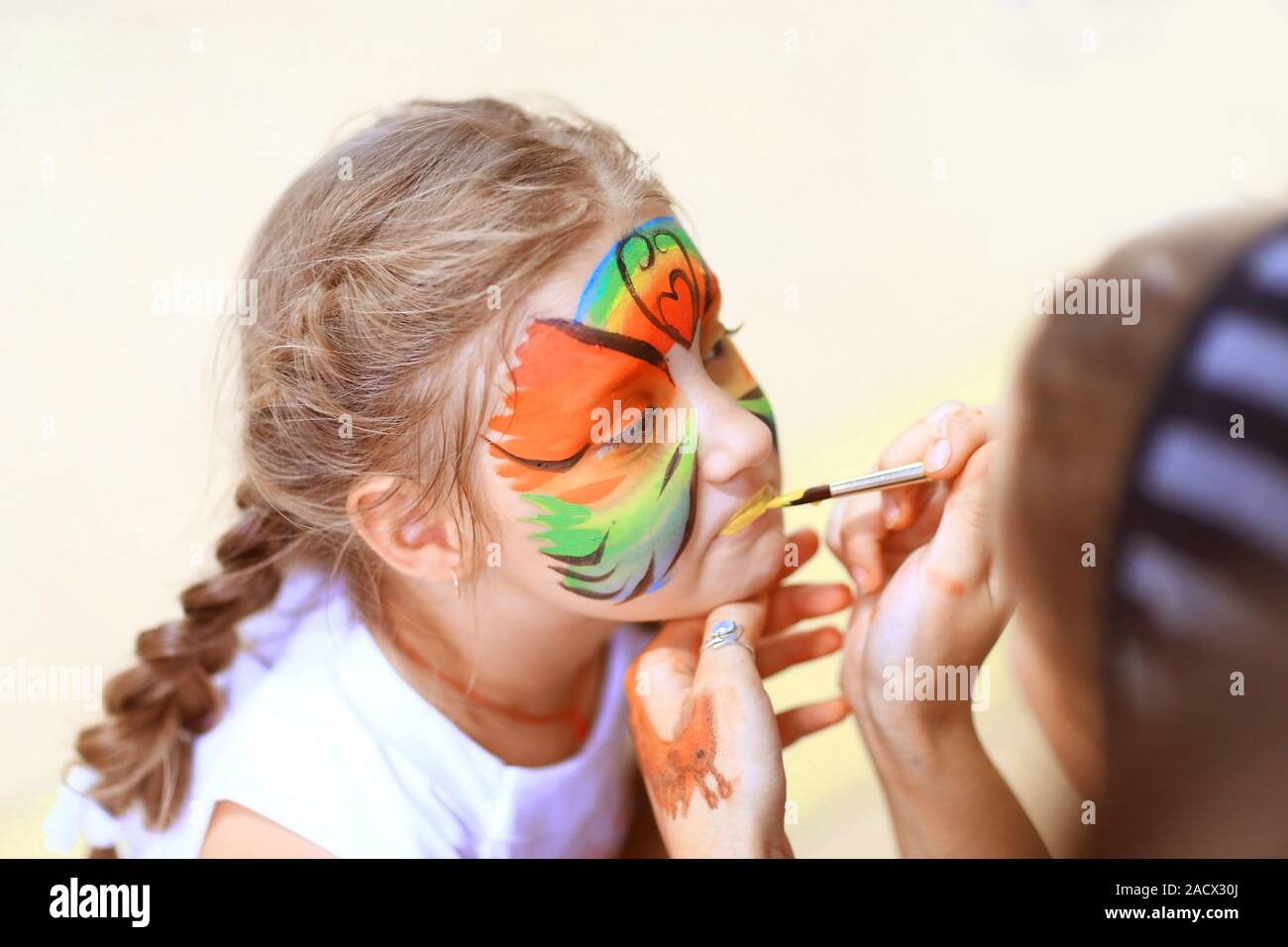 children's makeup artist, does animation make-up on little girls Stock ...