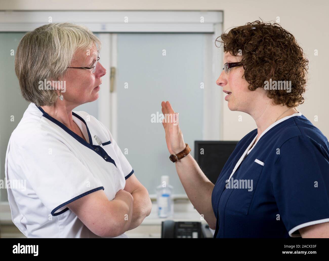 Two nurses arguing. Conflict resolution is a vital skill when working ...