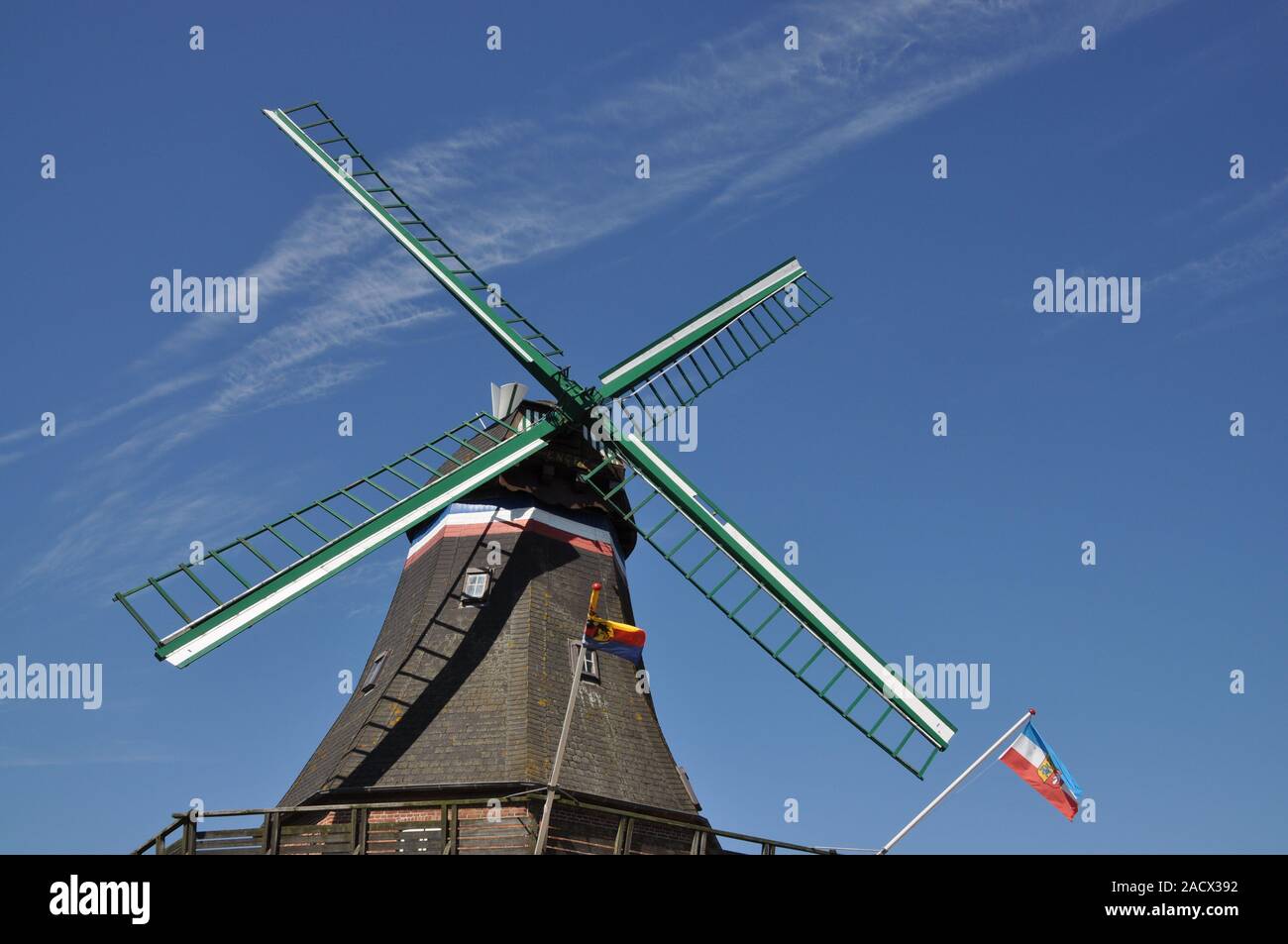 Windmill on northern beach Stock Photo - Alamy
