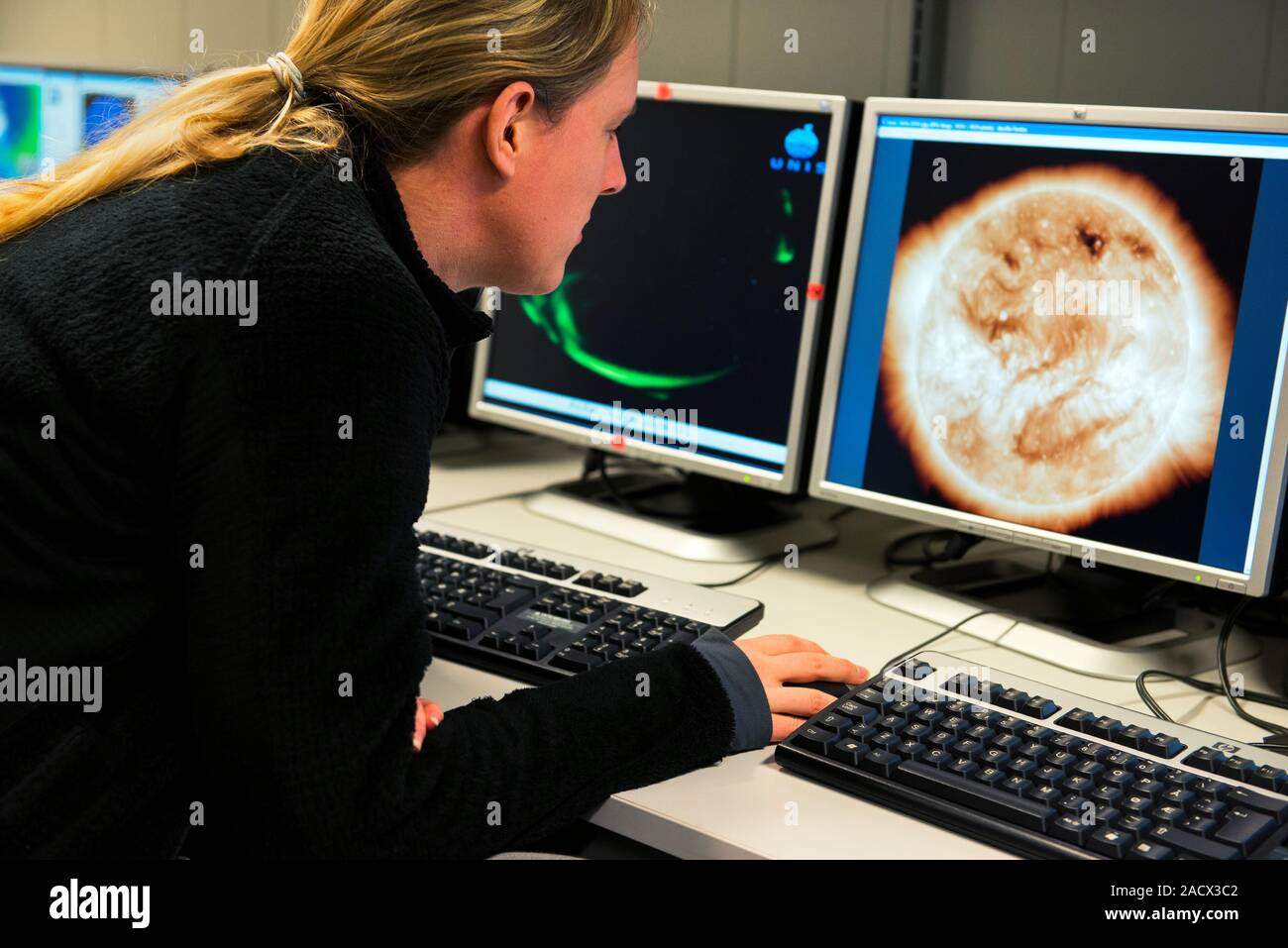 Lisa Baddeley, physicist, observing solar activity at her lab at the ...