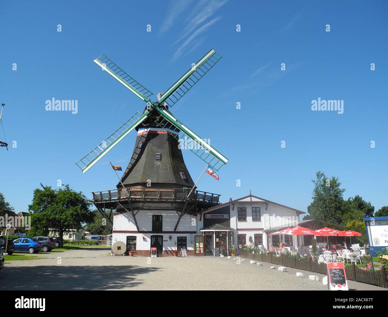 Windmill on northern beach Stock Photo - Alamy