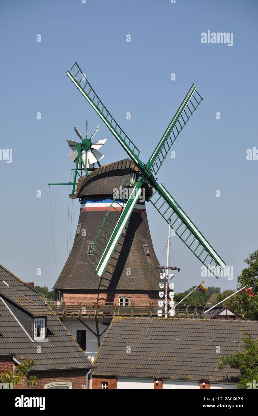 Windmill on northern beach Stock Photo - Alamy