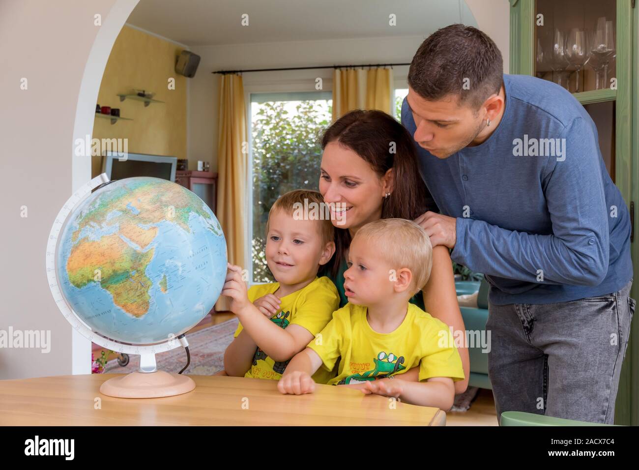 Family Plans Holiday Trip Stock Photo Alamy