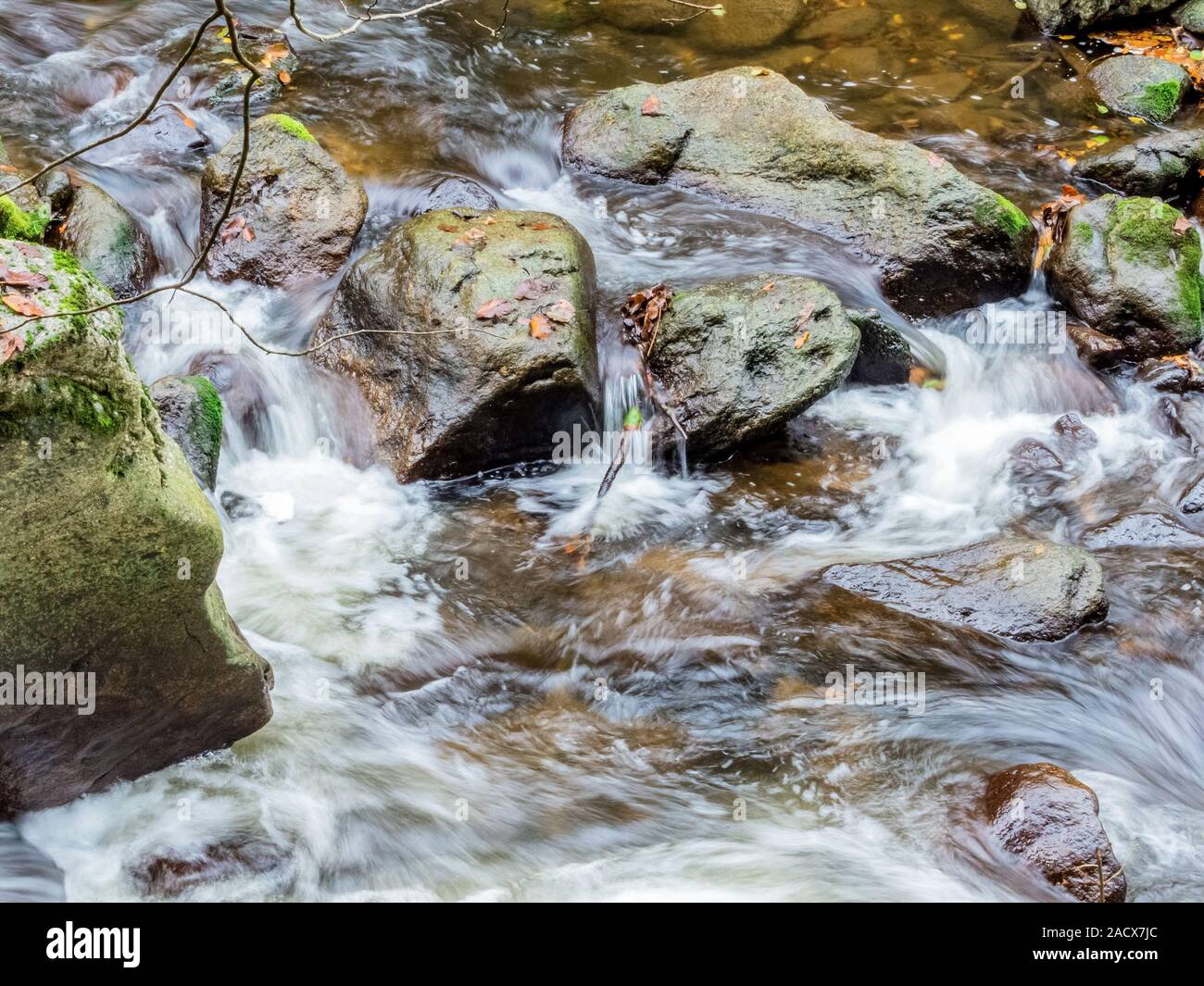 Stream with running water Stock Photo - Alamy