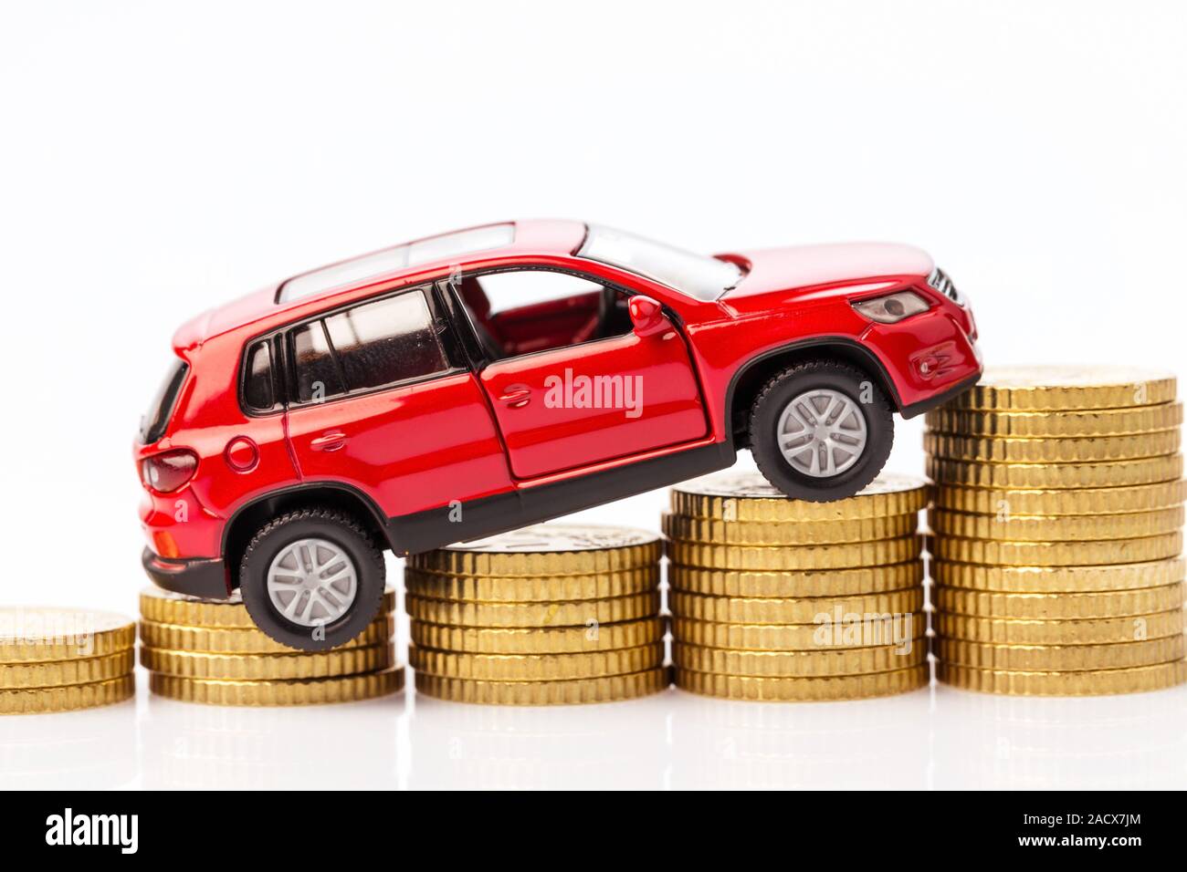 Car with coins Stock Photo - Alamy