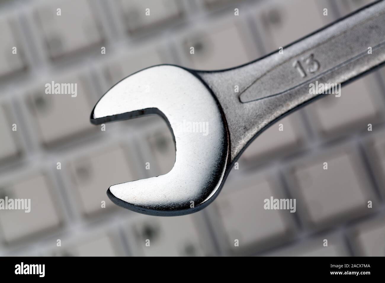 Tool on computer keyboard Stock Photo - Alamy