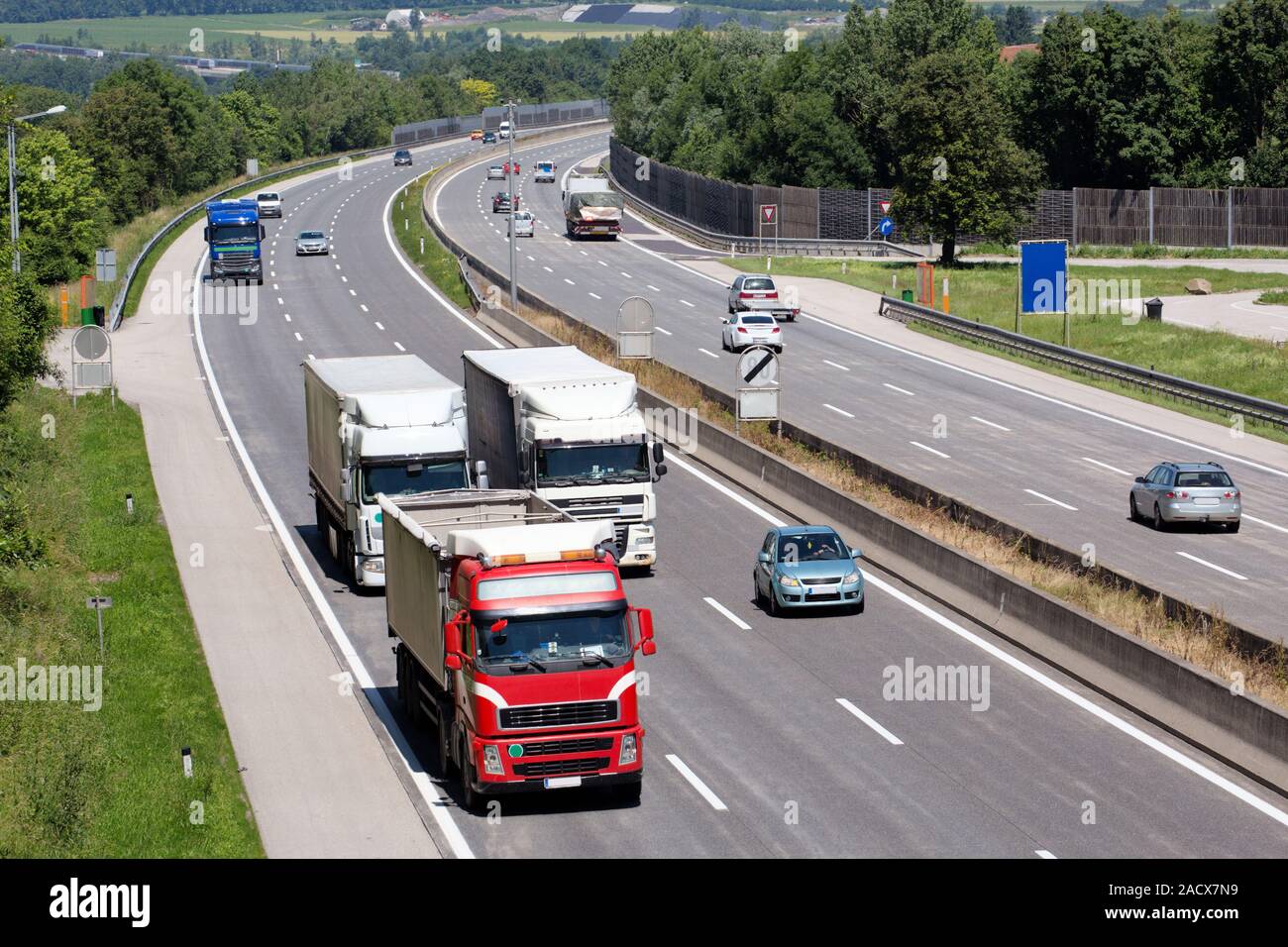 Trucks on the motorway Stock Photo - Alamy
