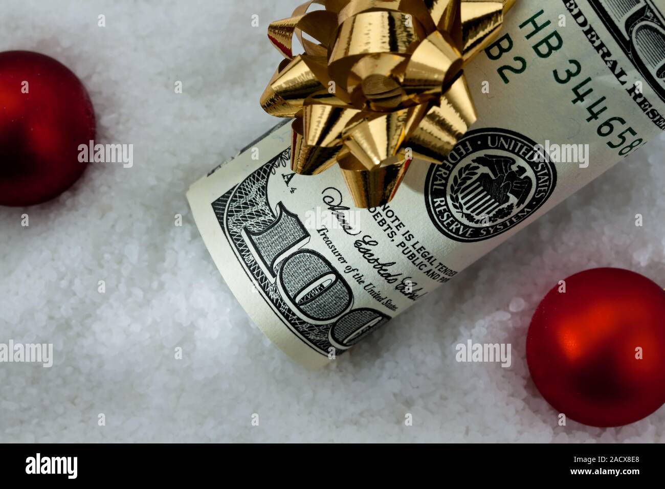 Dollar banknotes with ribbon as a money present Stock Photo - Alamy