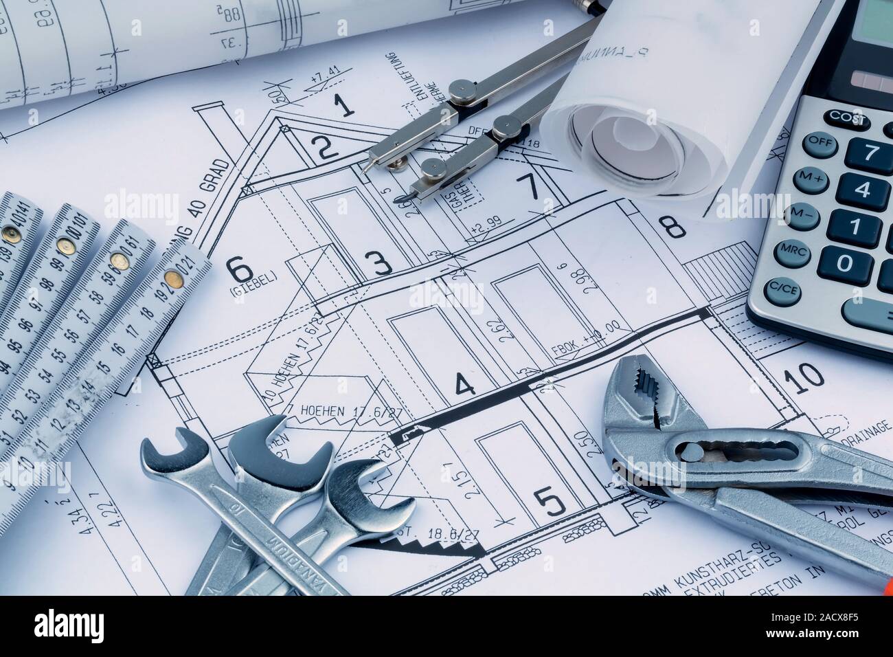 House plan with pocket calculator Stock Photo - Alamy