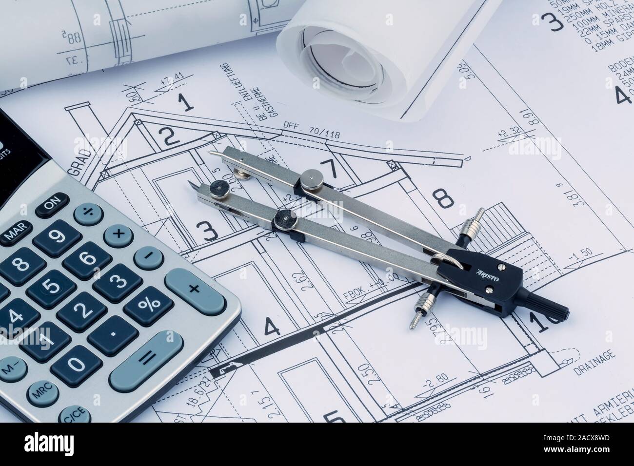 House plan with pocket calculator Stock Photo - Alamy