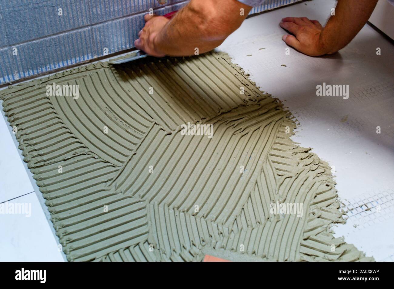 Tiler at work hi-res stock photography and images - Alamy