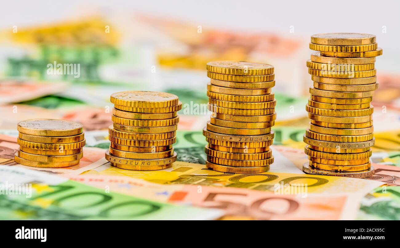 stack of money coins, rising curve Stock Photo - Alamy