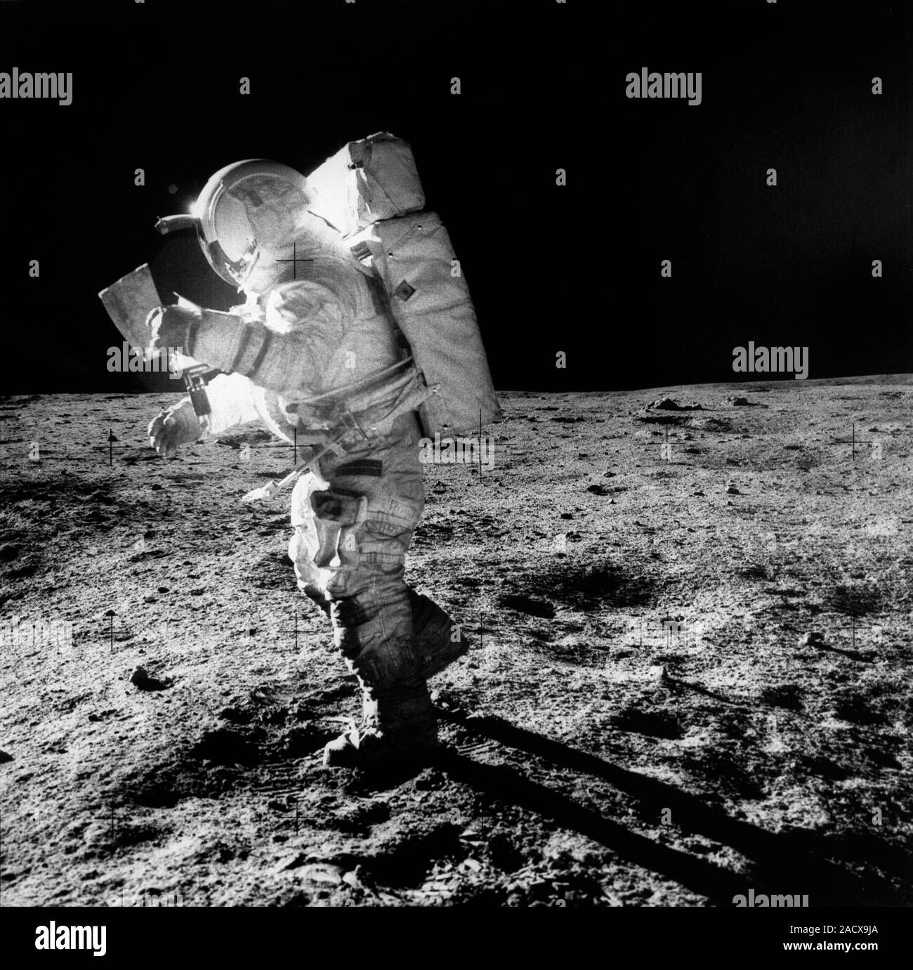 Apollo 14 astronaut Edgard Mitchell on the Moon searching the Cone ...