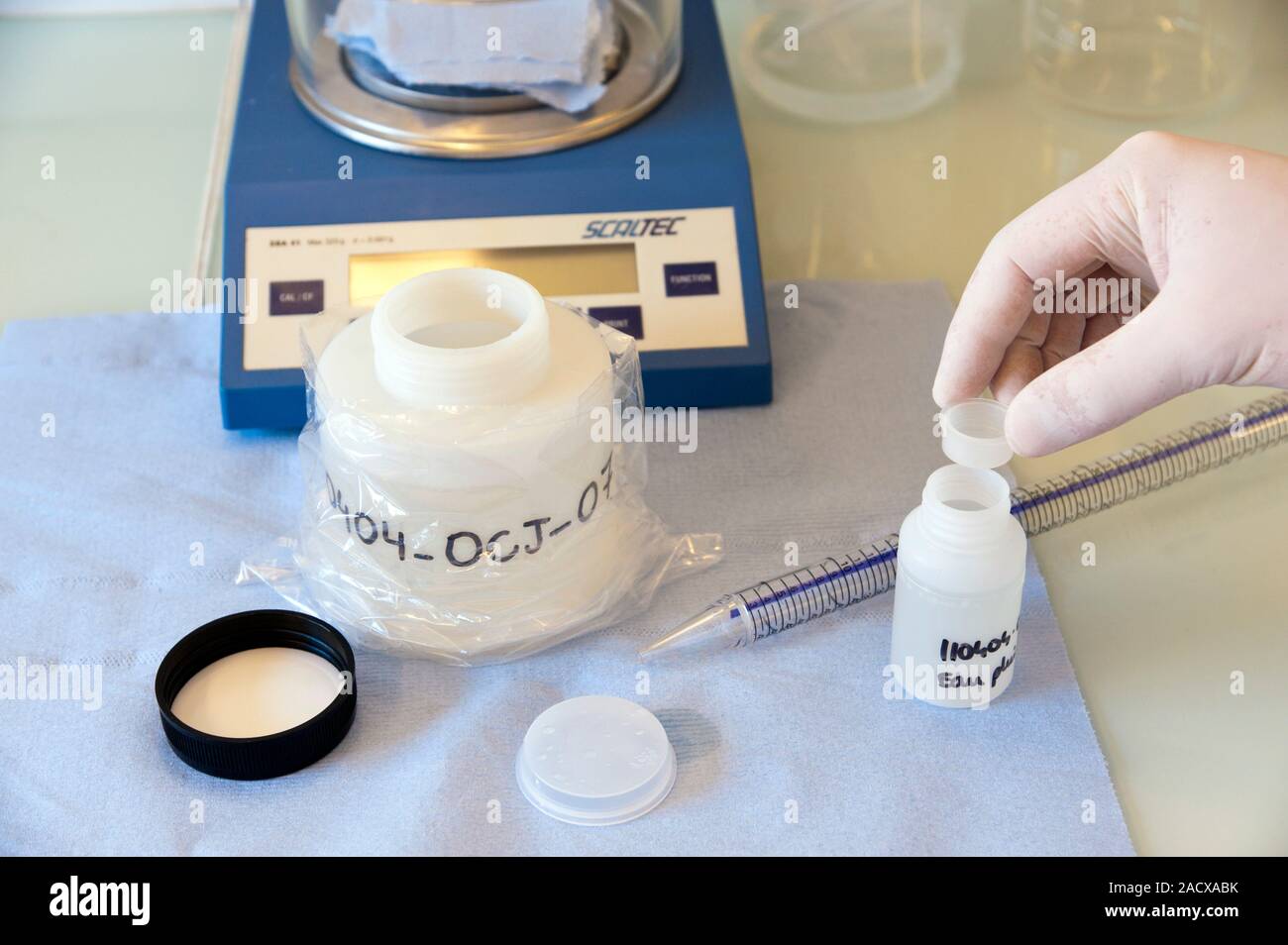 Water testing. A sample of water contaminated with radioactive elements ...