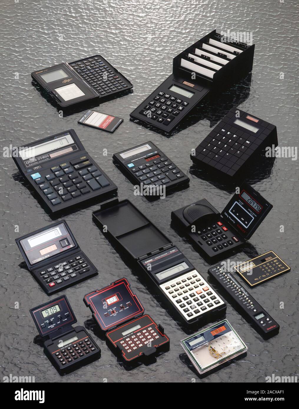 Calculators of various shapes and sizes Stock Photo - Alamy