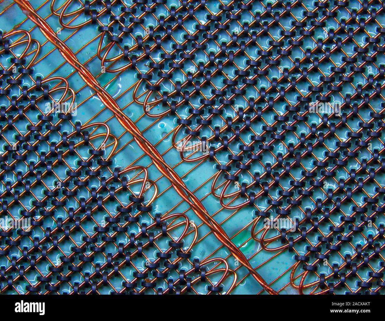 Magnetic-core memory array, macrophotograph. It uses tiny magnetic ... Magnetic-core memory array, macrophotograph. It uses tiny magnetic ...