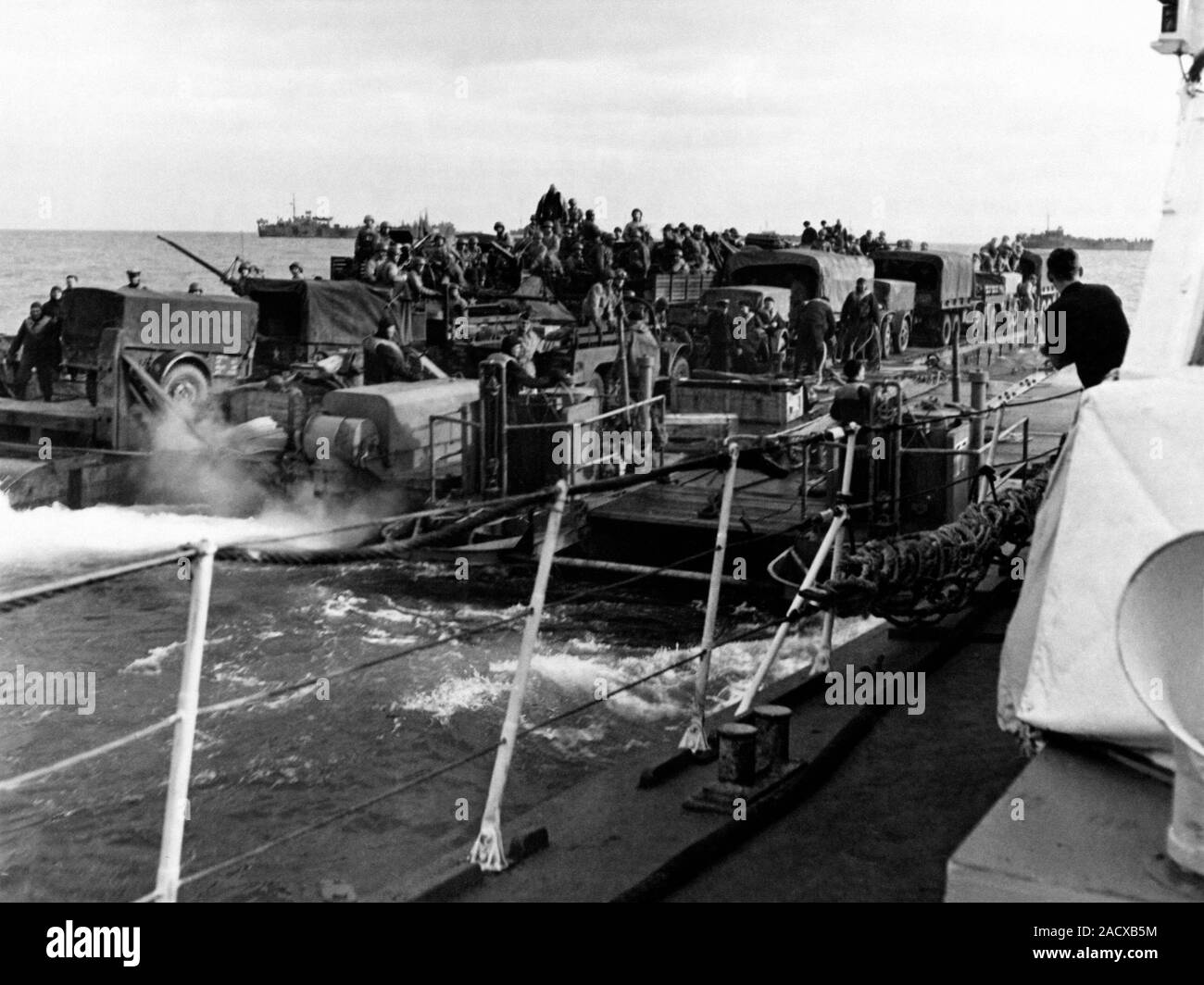 D-Day landings crossing. Ferries being used to transport troops and ...