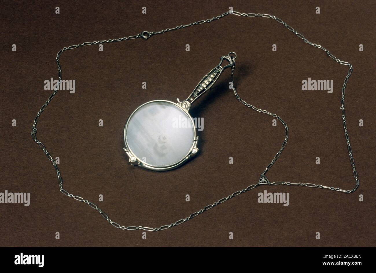 Silver lorgnette. Lorgnettes consist of a spectacles front and a single ...