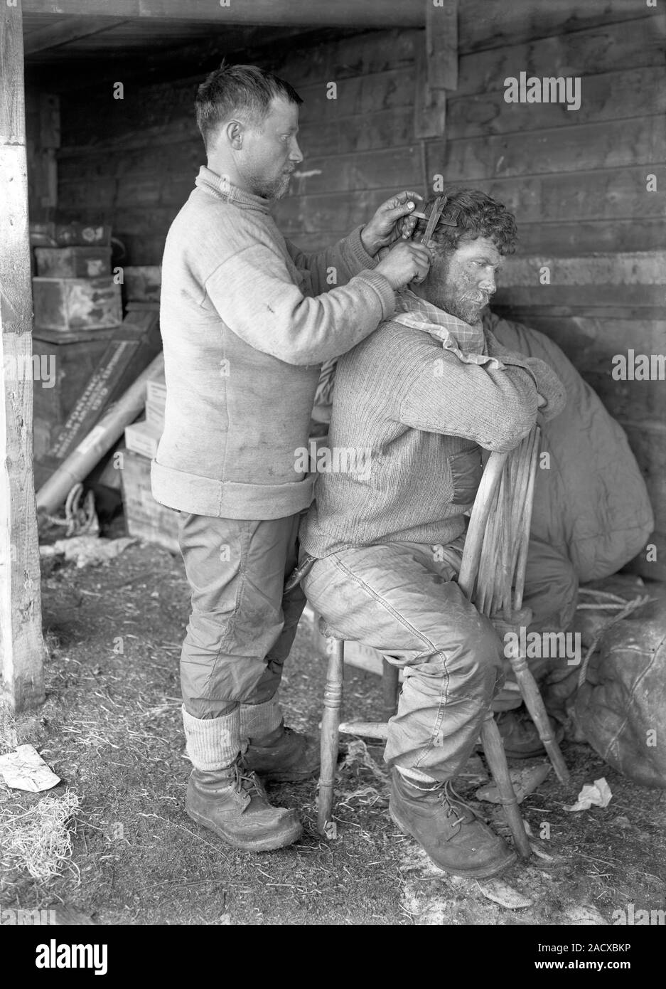 Hair cut in the Antarctic. Russian groom Anton Omelchenko (left, 1883 ...