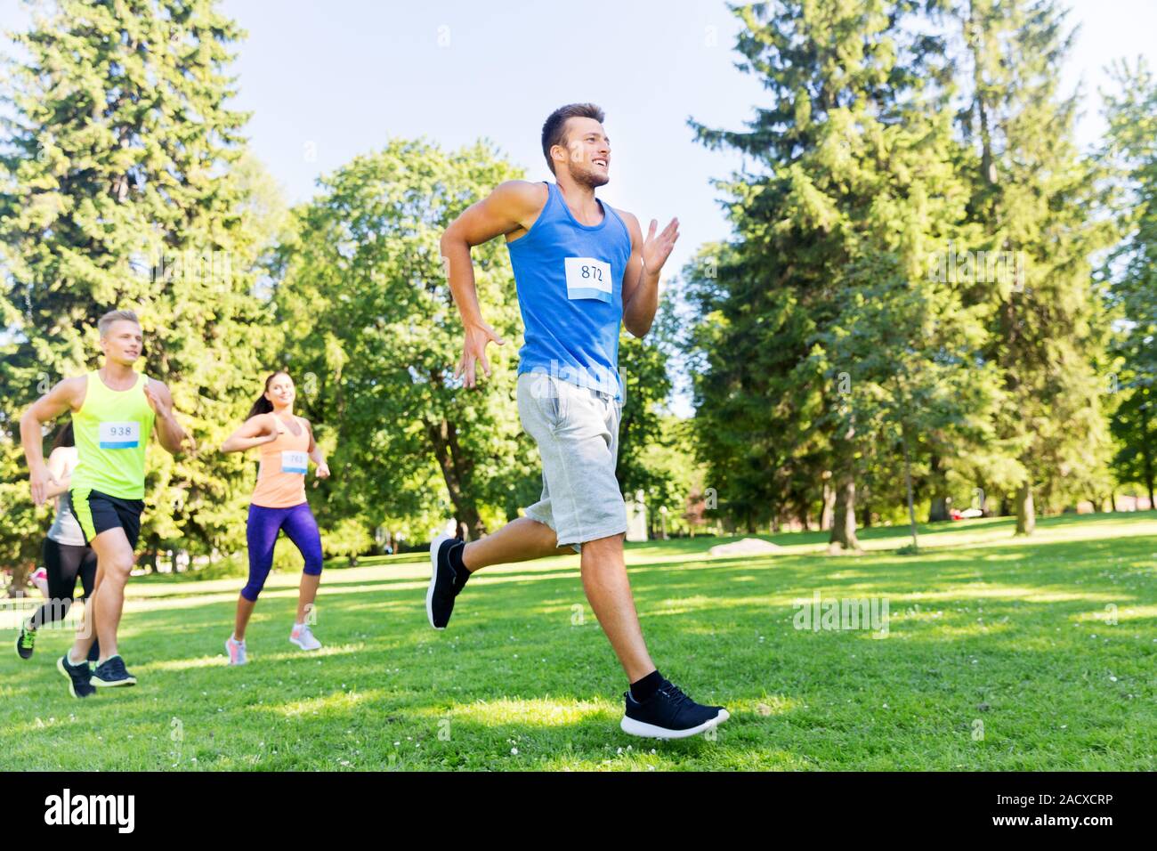 fitness, sport, race and healthy lifestyle concept - group of happy ...