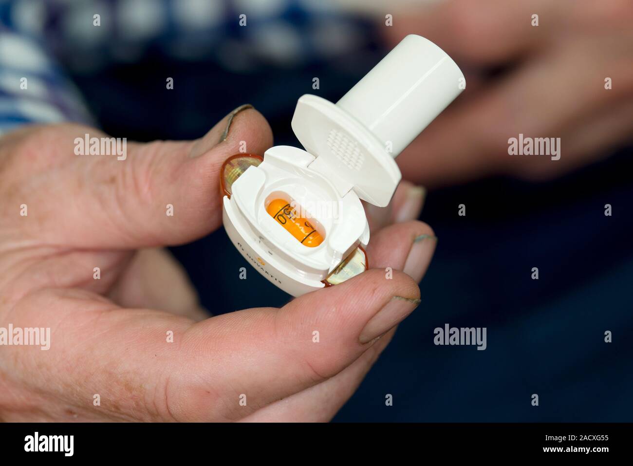 Seebri breezhaler, opened to show the capsule of medication inside ...
