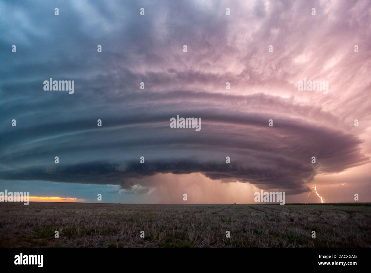 Supercell thunderstorm forming over rural Kansas, USA. A supercell ...