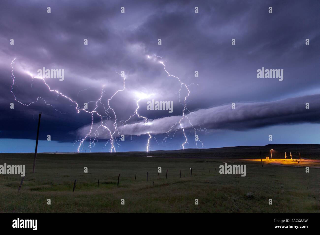 Lightning strikes over rural Wyoming, USA, time-exposure image. This ...