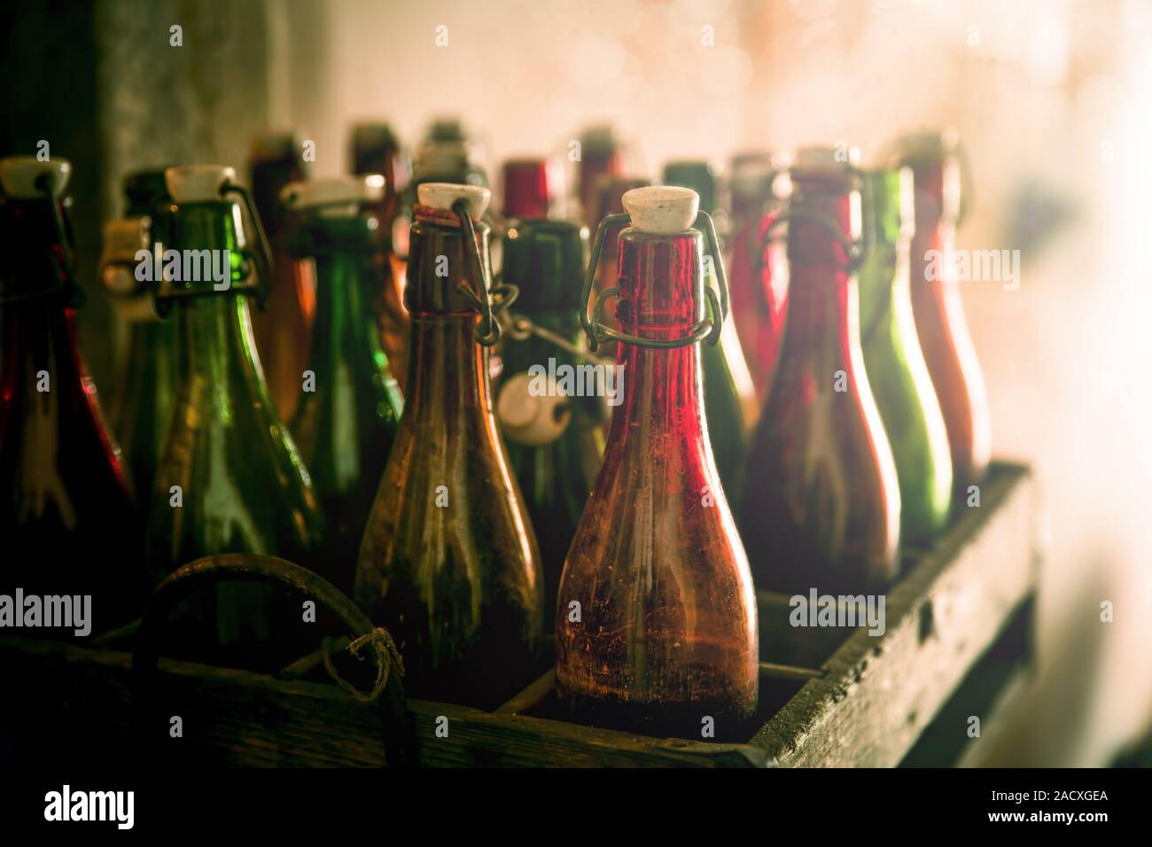 Old beer bottles in a wooden crate Stock Photo - Alamy