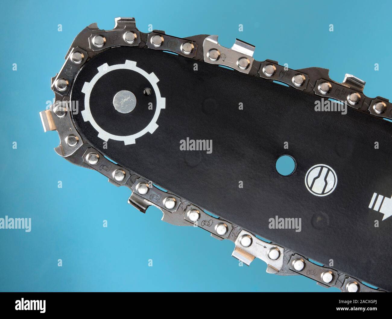 Section of a chainsaw showing the saw chain (or cutting chain) seated ...