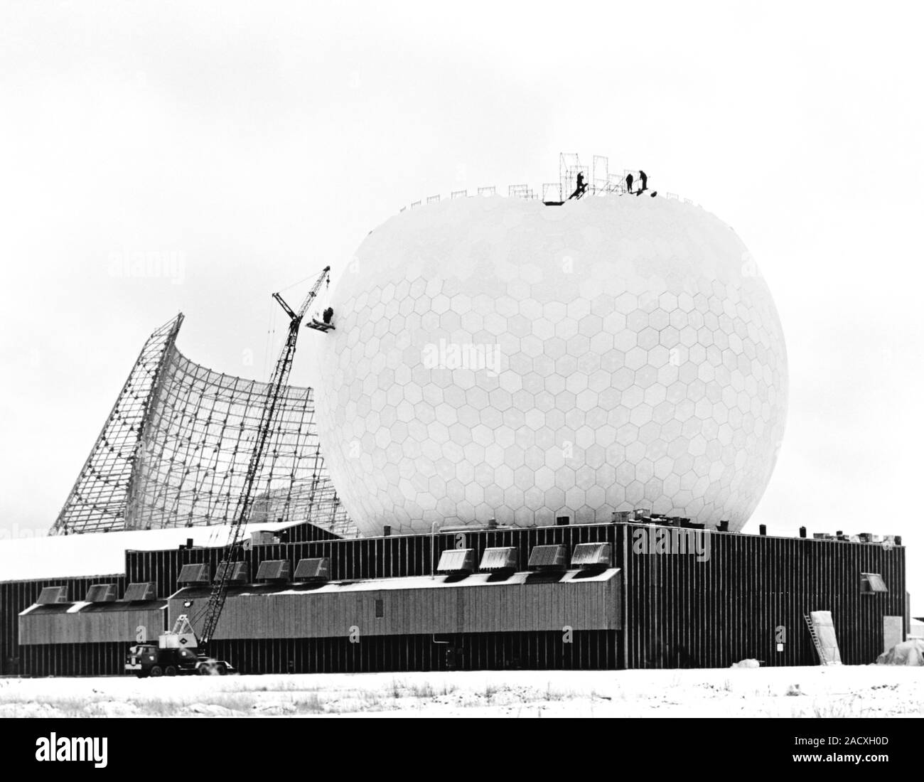 Construction of a geodesic dome housing radar antenna at Clear Air ...