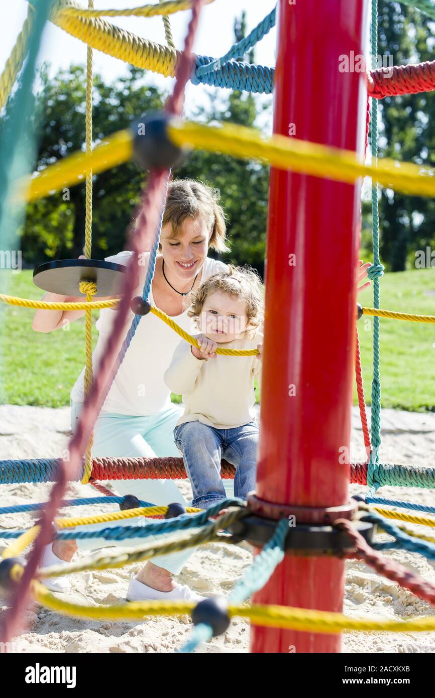 On the playground, merry-go-round Stock Photo - Alamy
