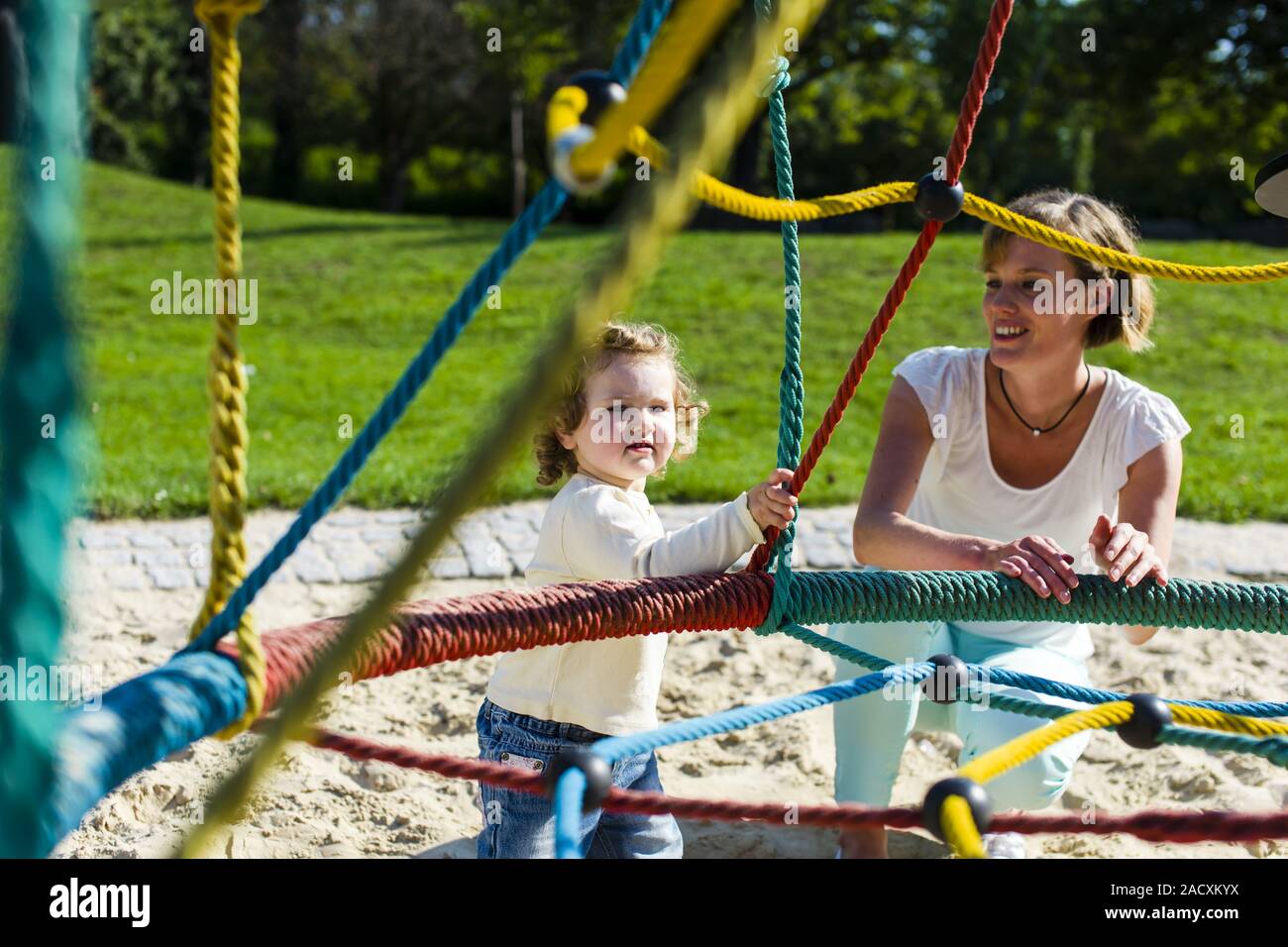 Playground roundabout hi-res stock photography and images - Alamy