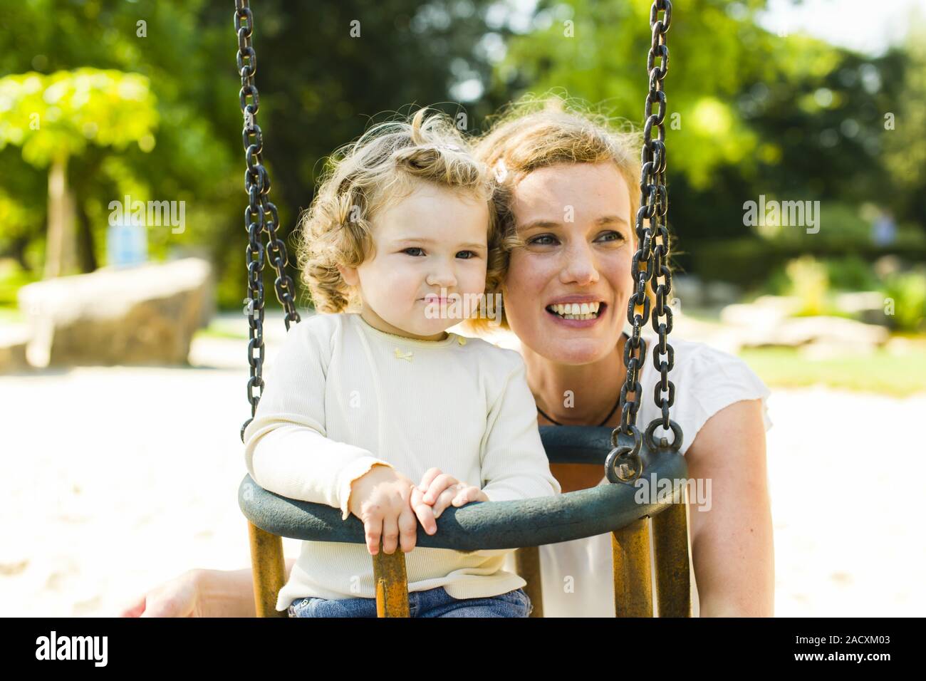 Baby swing playground hi-res stock photography and images - Alamy