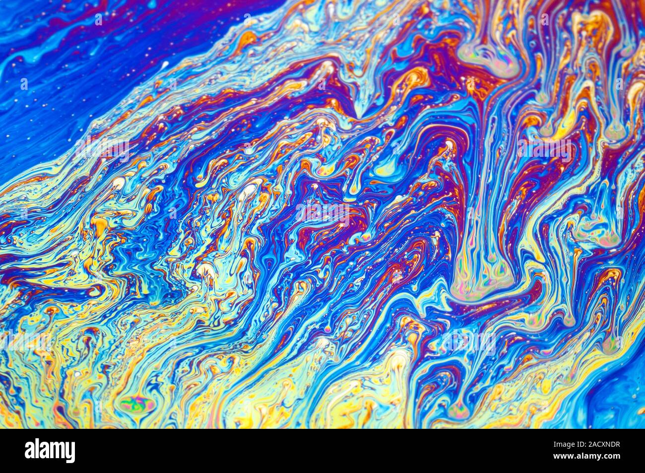 Soap bubble iridescence. Iridescence is the property of certain ...