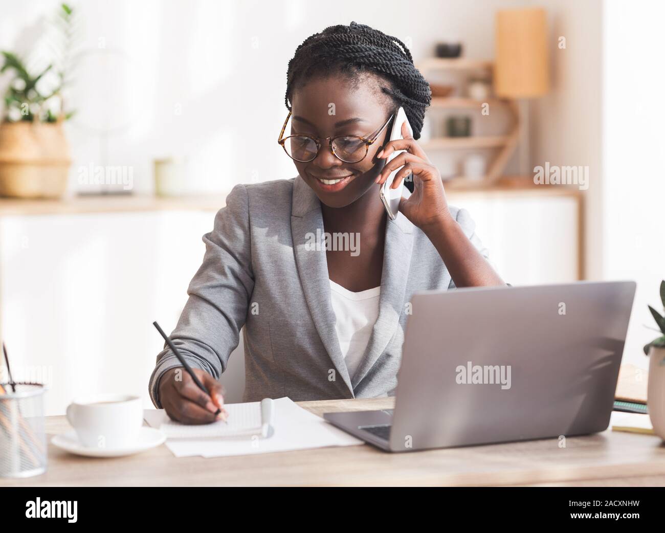 Beautiful office girl taking notes hi-res stock photography and images ...