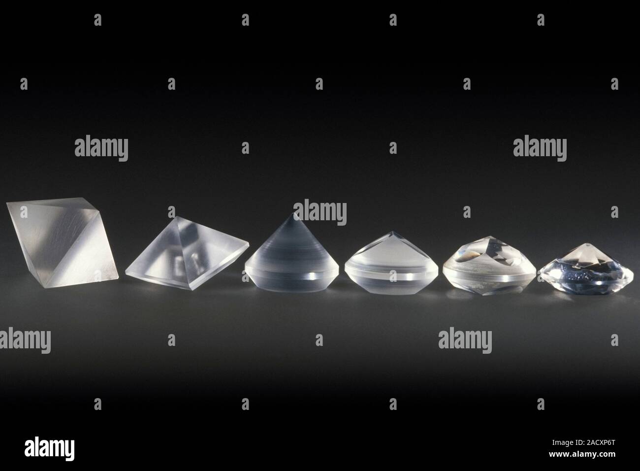 Pre-cut diamond forms, showing the stages of cutting facets to produce ...