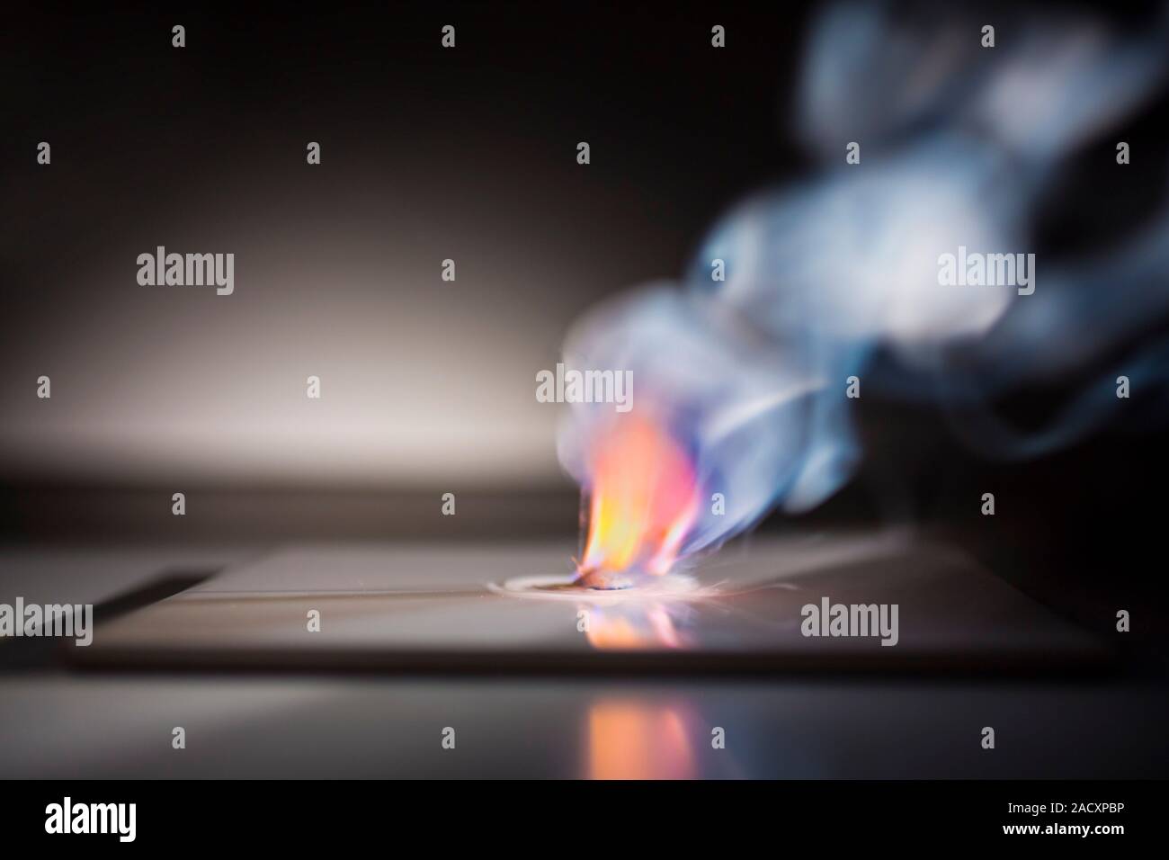 Potassium burning in water. When water and metallic potassium come into ...