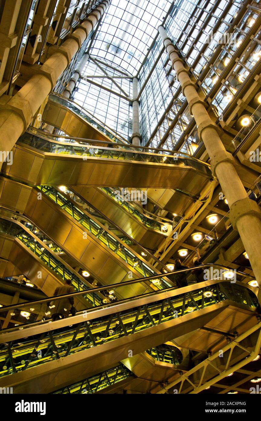 The atrium of Lloyds of London showing exposed escalator mechanisms ...