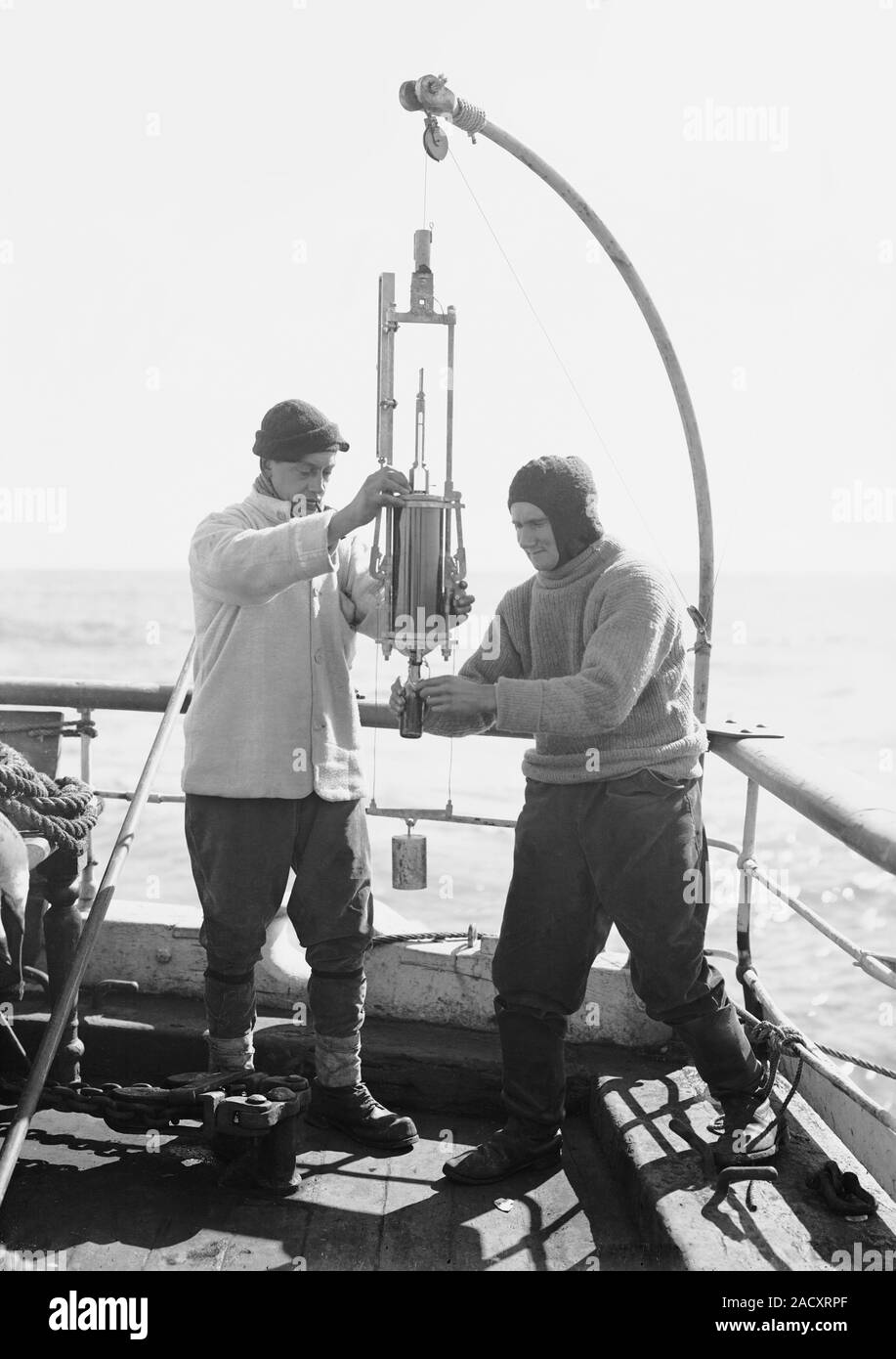 Antarctic oceanography research. British biologists Edward W. Nelson ...
