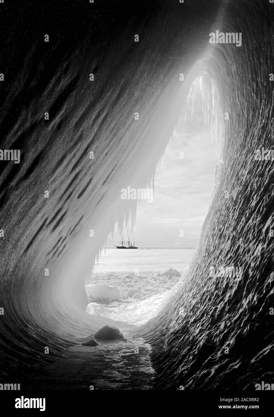 Antarctic ice grotto and Terra Nova. View from inside a large curved ...